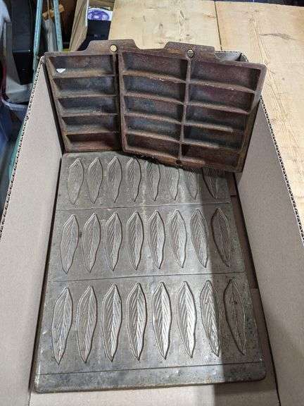 Tin Chocolate Mold and Cast Iron Molds - Bid On Estates Auction Services