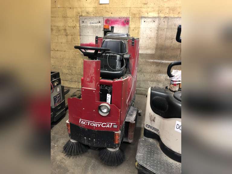 FACTORY CAT FLOOR SWEEPER - Bolinger Real Estate & Auction
