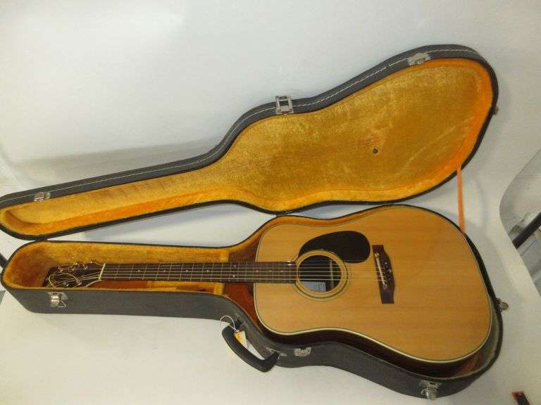 Sigma Six String Acoustic Guitar with Case - Prime Time Auctions, Inc.