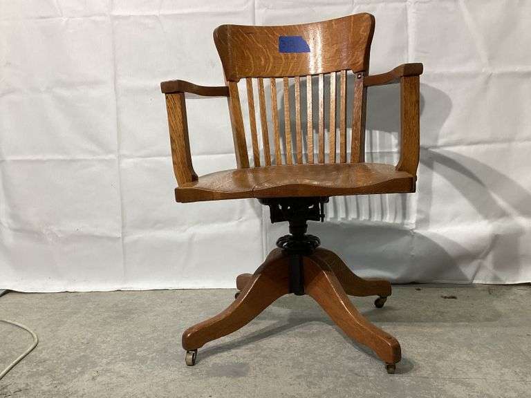 Wooden Swivel Chair - Currie Auction Service