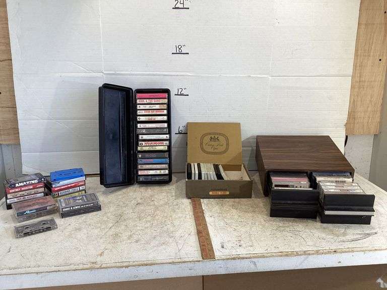 VARIETY CASSETTE TAPES AND CASSETTE STORAGE BOXES - Currie Auction Service