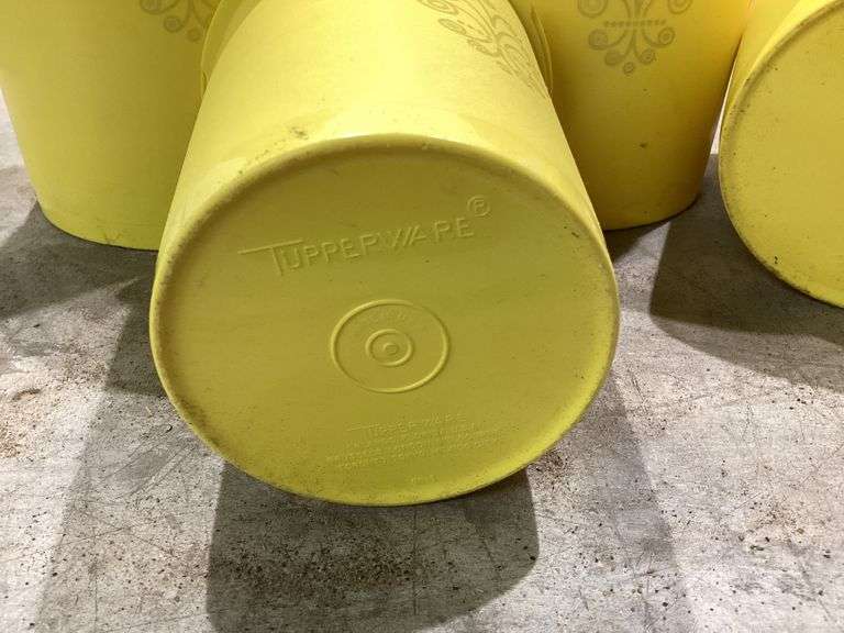 VINTAGE YELLOW TUPPERWARE - Currie Auction Service