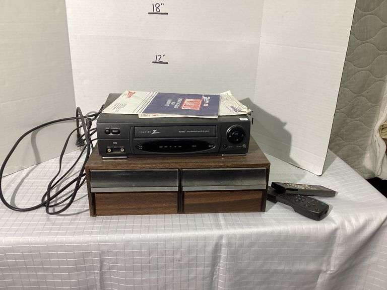 ZENITH VCR AND VHS STORAGE - Currie Auction Service