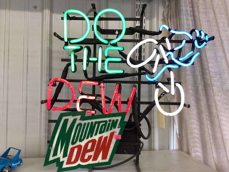NEON MT DEW BMX SIGN - Currie Auction Service