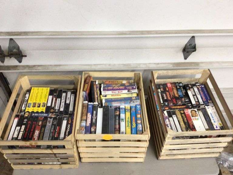 3 WOODEN CRATES WITH ASSORTED VHS MOVIES - Currie Auction Service