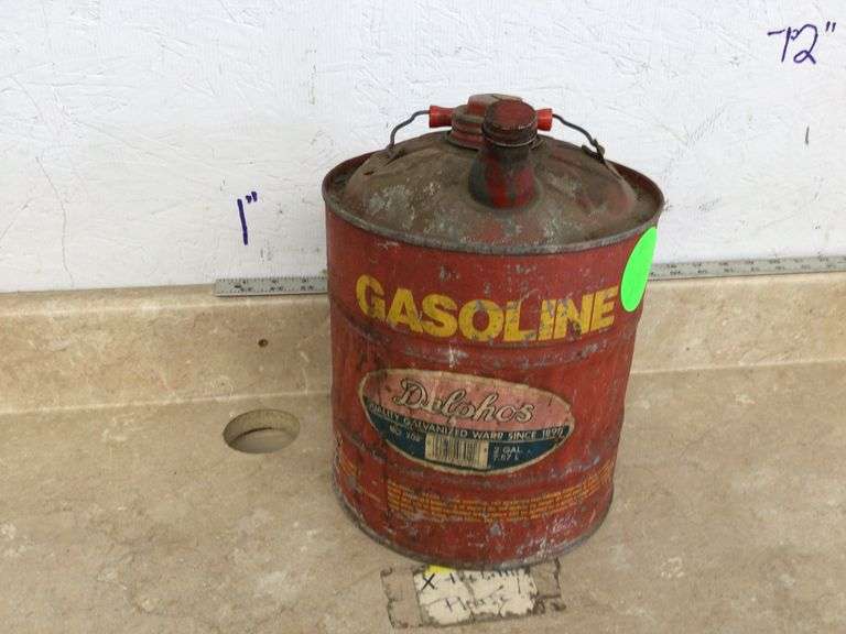 RED 2-GALLON METAL FUEL CAN - Currie Auction Service