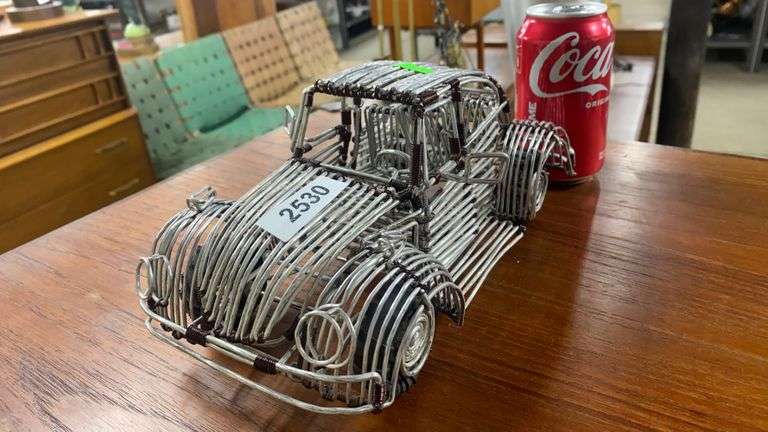 Wire art Volkswagen Beetle sculpture - Dixon's Auction at Crumpton