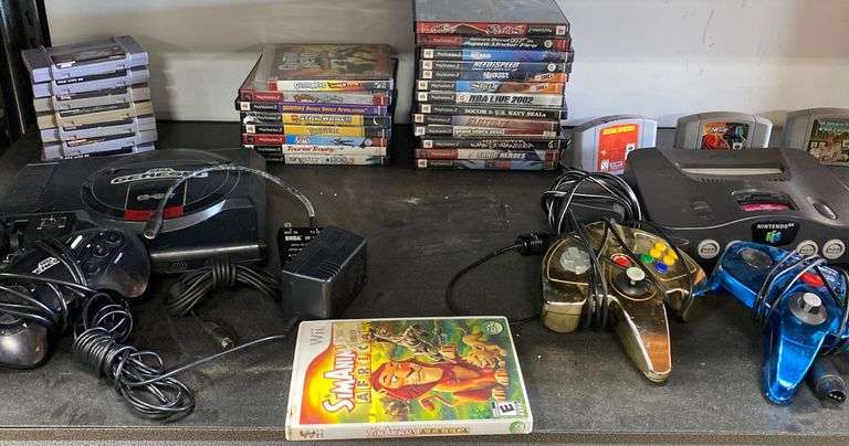 Lot Nintendo 64 + Sega Genesis Game Systems, Controllers Games etc ...