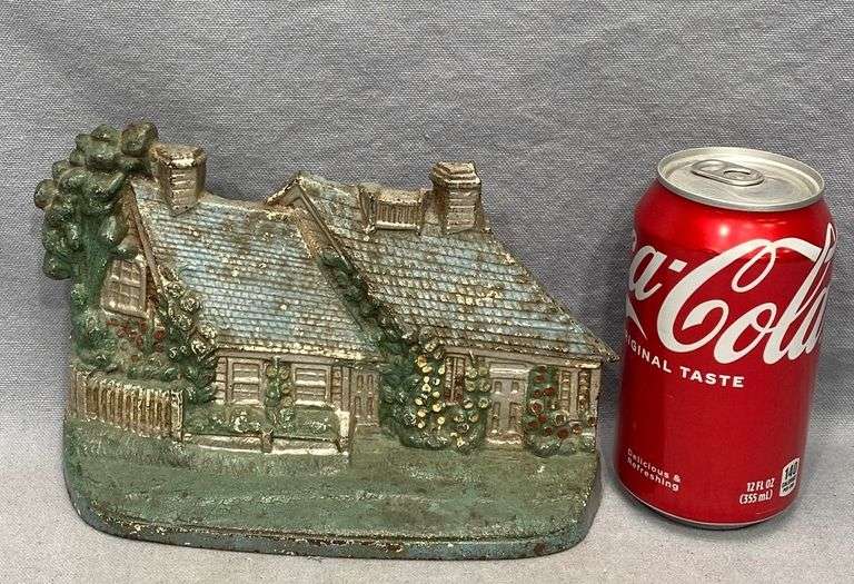 Antique cast iron cottage doorstop - Dixon's Auction at Crumpton
