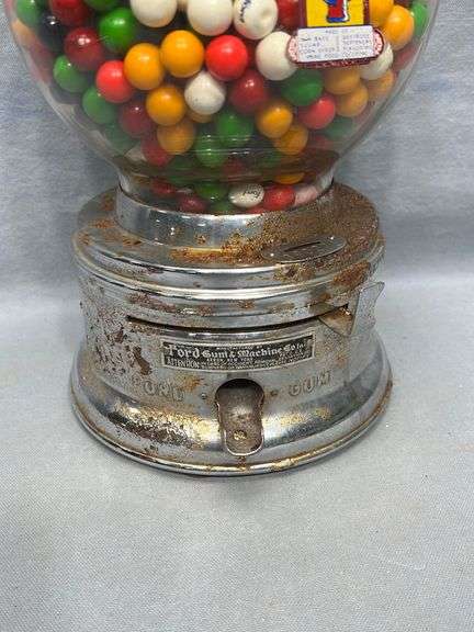 Vintage Ford gumball machine, rust - Dixon's Auction at Crumpton