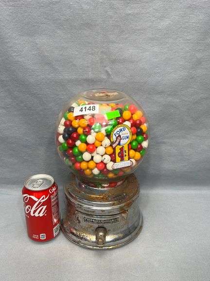 Vintage Ford gumball machine, rust - Dixon's Auction at Crumpton