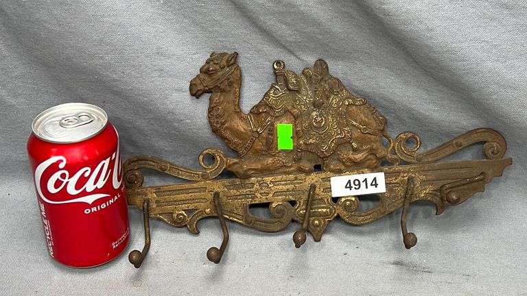 Antique cast iron camel wall rack - Dixon's Auction at Crumpton