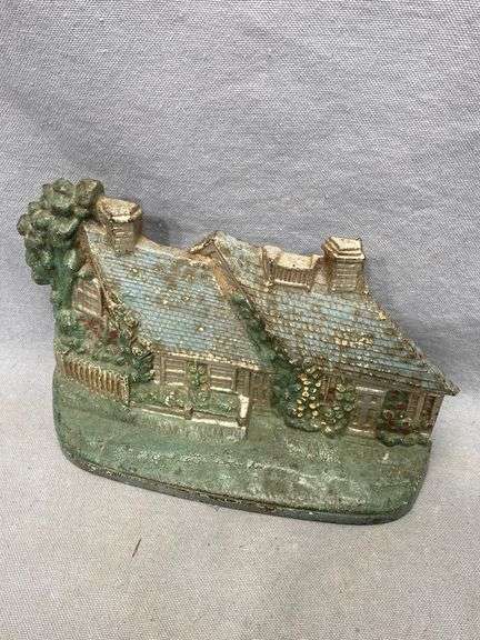 Antique cast iron cottage doorstop - Dixon's Auction at Crumpton