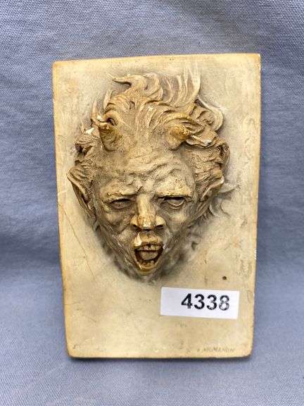 Composition plaque of grotesque man-signed - Dixon's Auction at Crumpton