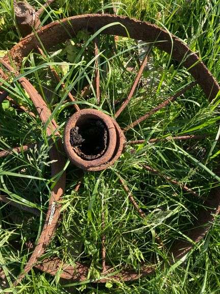 (3) Antique Metal Tractor Wheels - Delaware Auction Center