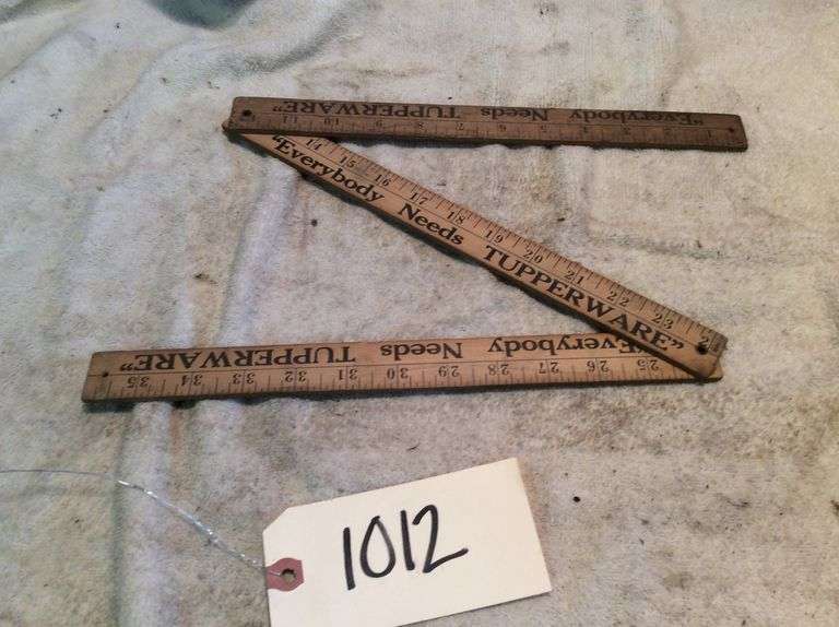 Tupperware Foldable Yard Stick - Duck Soup Auctions