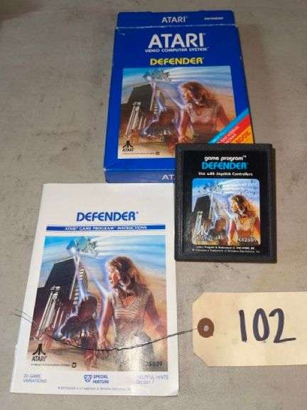 Defender Atari game with box • Main - Duck Soup Auctions