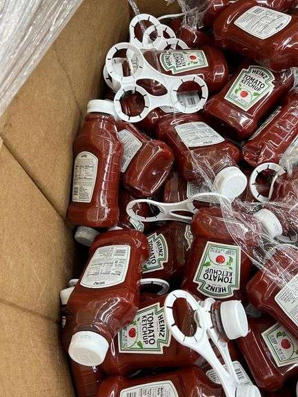 LARGE PALLET OF HEINZ KETCHUP BOTTLES - Earl's Auction Company