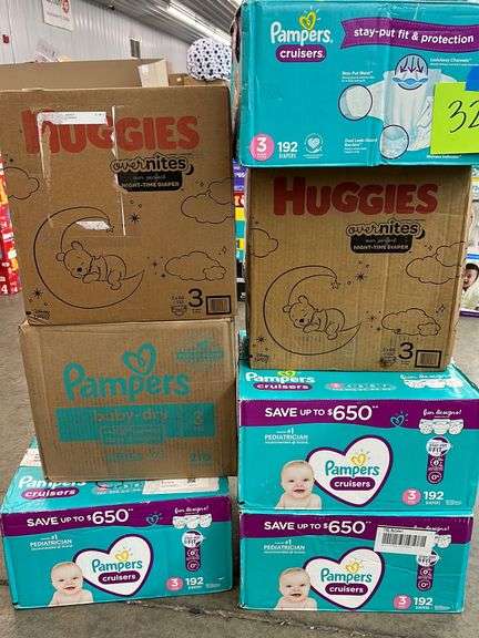 (7) BOXES OF ASSORTED DIAPERS - Earl's Auction Company