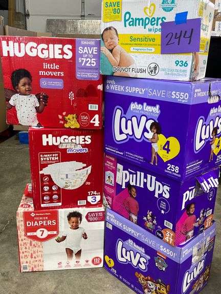 (7) BOXES OF ASSORTED DIAPERS - Earl's Auction Company