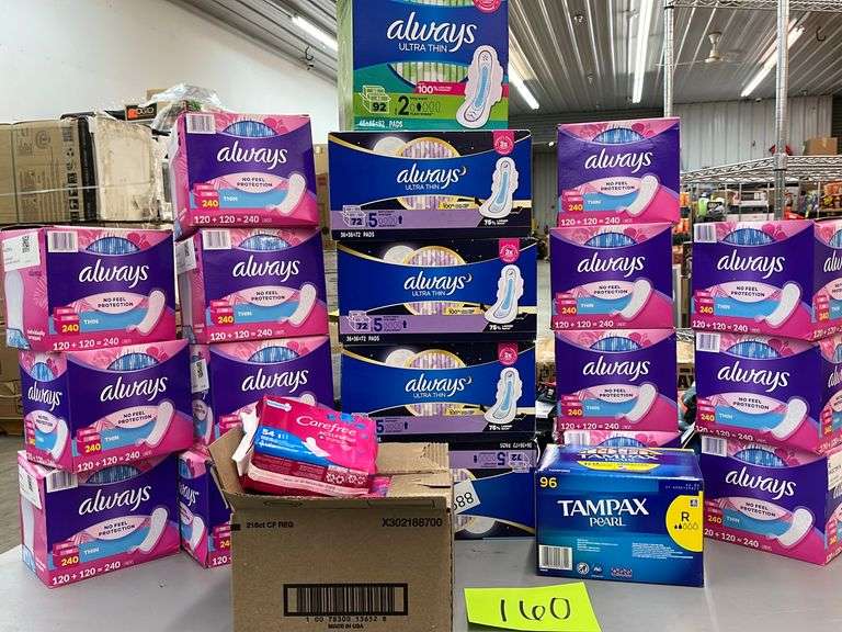 (21) BOXES OF WOMENS PADS - Earl's Auction Company