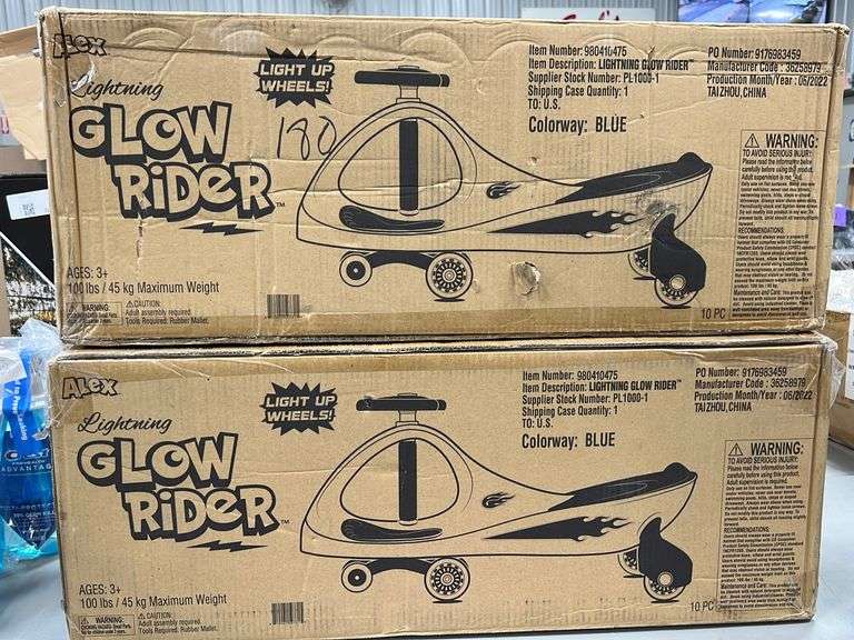 (2) KIDS GLOW RIDER RIDE ON IN BOXES - BLUE - Earl's Auction Company