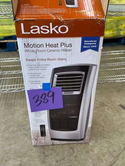LASKO MOTION HEAT PLUS HEATER IN BOX - Earl's Auction Company