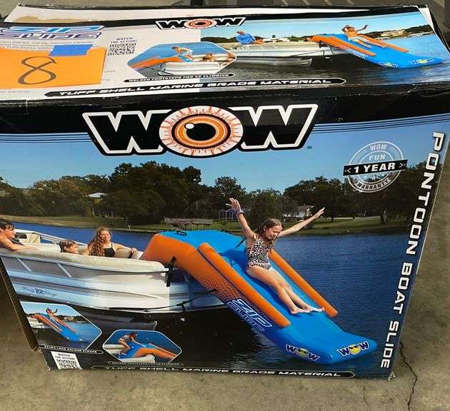 WOW INFLATABLE PONTOON BOAT SLIDE IN BOX - Earl's Auction Company