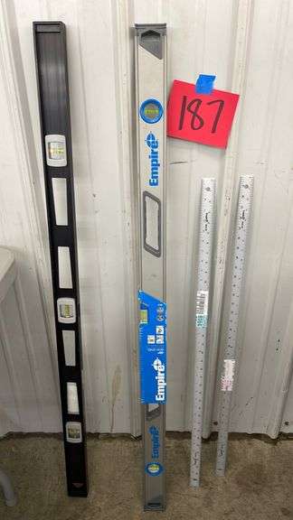 2 LEVELS & 2 MEASURING STICKS - Earl's Auction Company