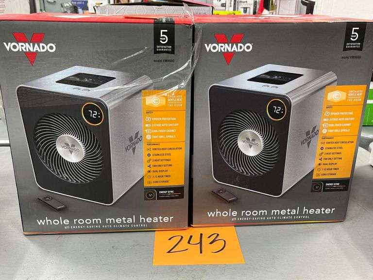 (2) VORNADO WHOEL ROOM METAL HEATERS IN BOXES - Earl's Auction Company
