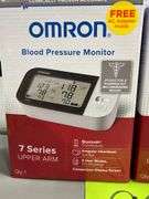 (2) OMRON BLOOD PRESSURE MONITORS IN BOXES - Earl's Auction Company