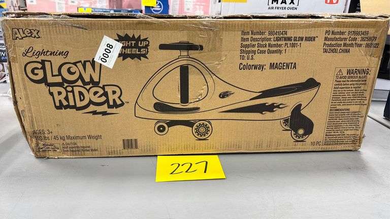 KIDS LIGHTNING GLOW RIDER IN BOX - Earl's Auction Company