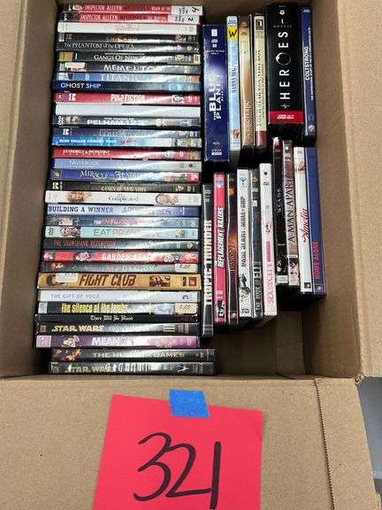 APPROX 50 ASSORTED DVDS - Earl's Auction Company