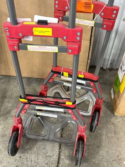 (2) MILWAUKEE COMPACT FOLDING DOLLIES - Earl's Auction Company