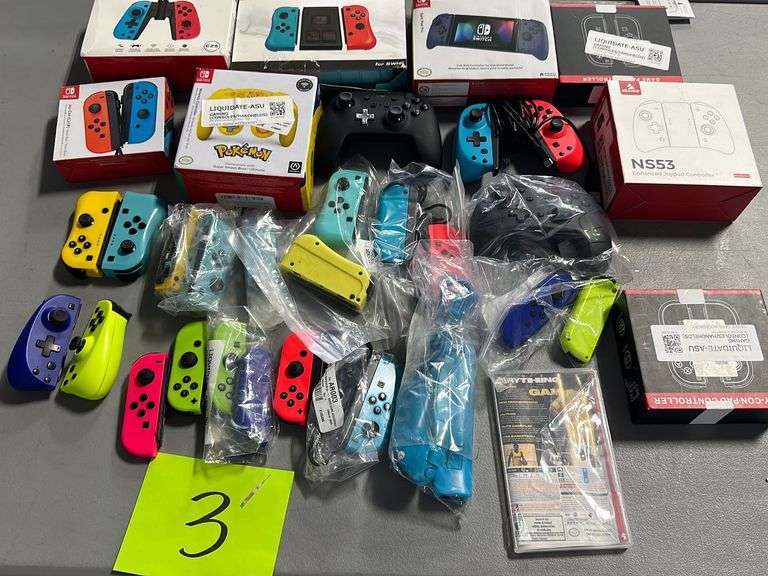 LARGE LOT OF ASSORTED NINTENDO SWITCH ACCESSORIES - Earl's Auction Company