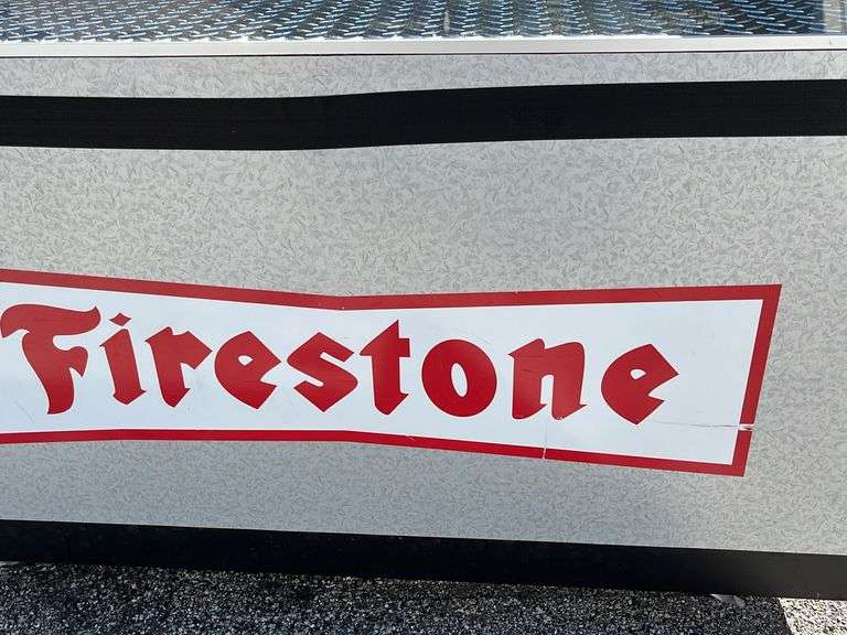 IMS FIRESTONE DISPLAY CASE/STAND - Earl's Auction Company