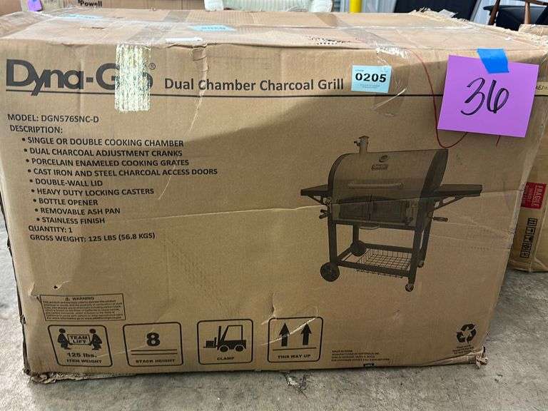DYNA GLO DUAL CHAMBER CHARCOAL GRILL IN BOX - Earl's Auction Company