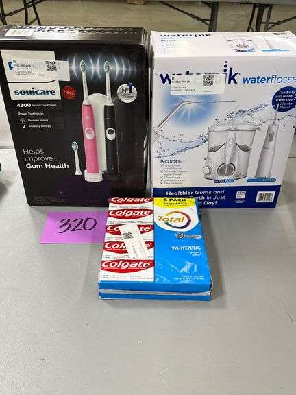PHILLIPS SONICARE TOOTHBRUSH, WATERPIK & COLGATE TOOTHPASTE - Earl's ...