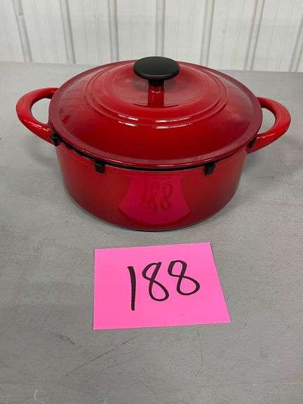 RED CAST IRON DUTCH OVEN - Earl's Auction Company