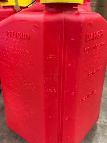 (4) 5 GALLON GASOLINE CANS - Earl's Auction Company