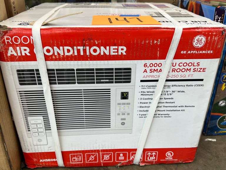 GE ROOM AIR CONDITIONER IN BOX - Earl's Auction Company