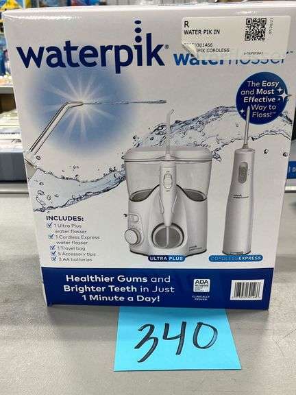 WATERPIK WATER FLOSSER IN BOX - Earl's Auction Company