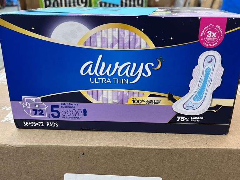(4) BOXES OF WOMENS PADS - Earl's Auction Company
