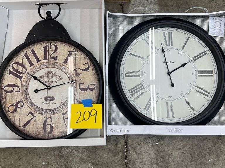 (2) WALL CLOCKS IN BOXES - Earl's Auction Company