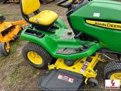 JOHN DEERE X320 RIDING MOWER - EK Auctioneers LLC
