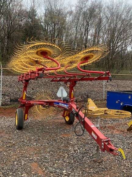 NEW HOLLAND PRO CART 1022 10 WHEEL RAKE - EK Auctioneers LLC