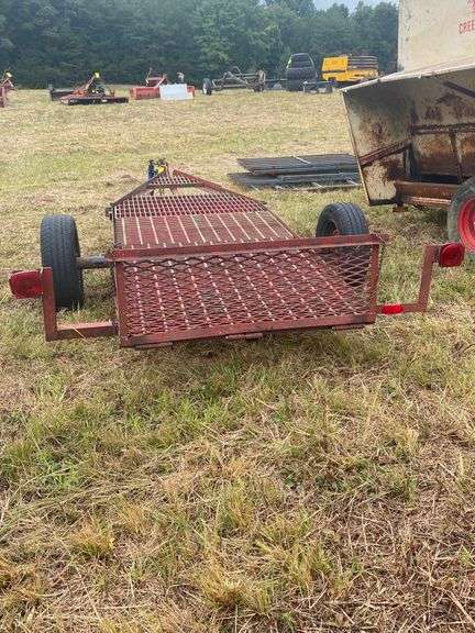 TAG ALONG MESH TRAILER - EK Auctioneers LLC