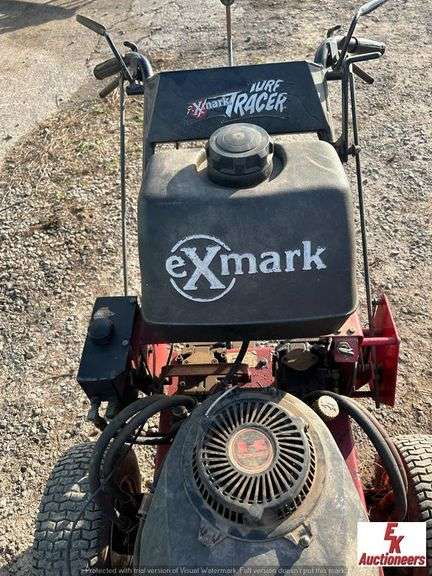 EXMARK TURF TRACKER WALK BEHIND MOWER - EK Auctioneers LLC