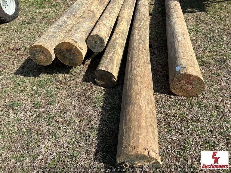 (9) 8"X10' TREATED UTILITY POLES - EK Auctioneers LLC