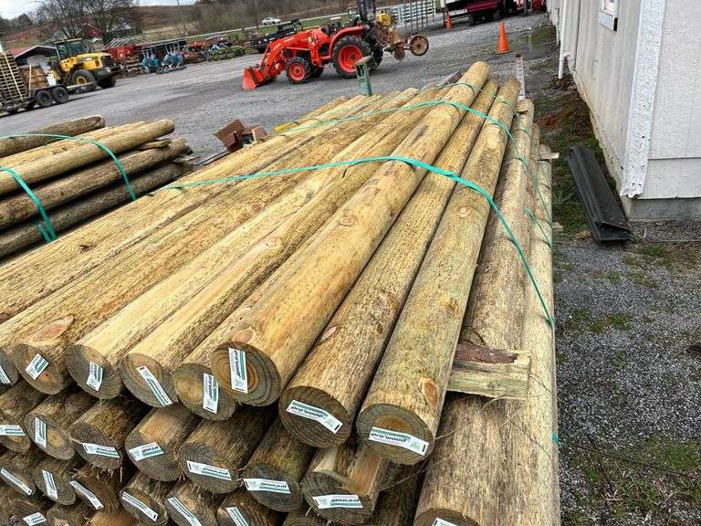4"X8' PRESSURE TREATED POSTS-55 IN BUNDLE - EK Auctioneers LLC